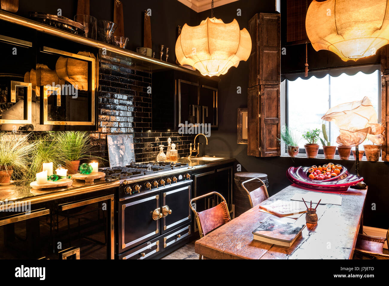 Shiny black metro tiles with enamelled console and 1950s parchment ...