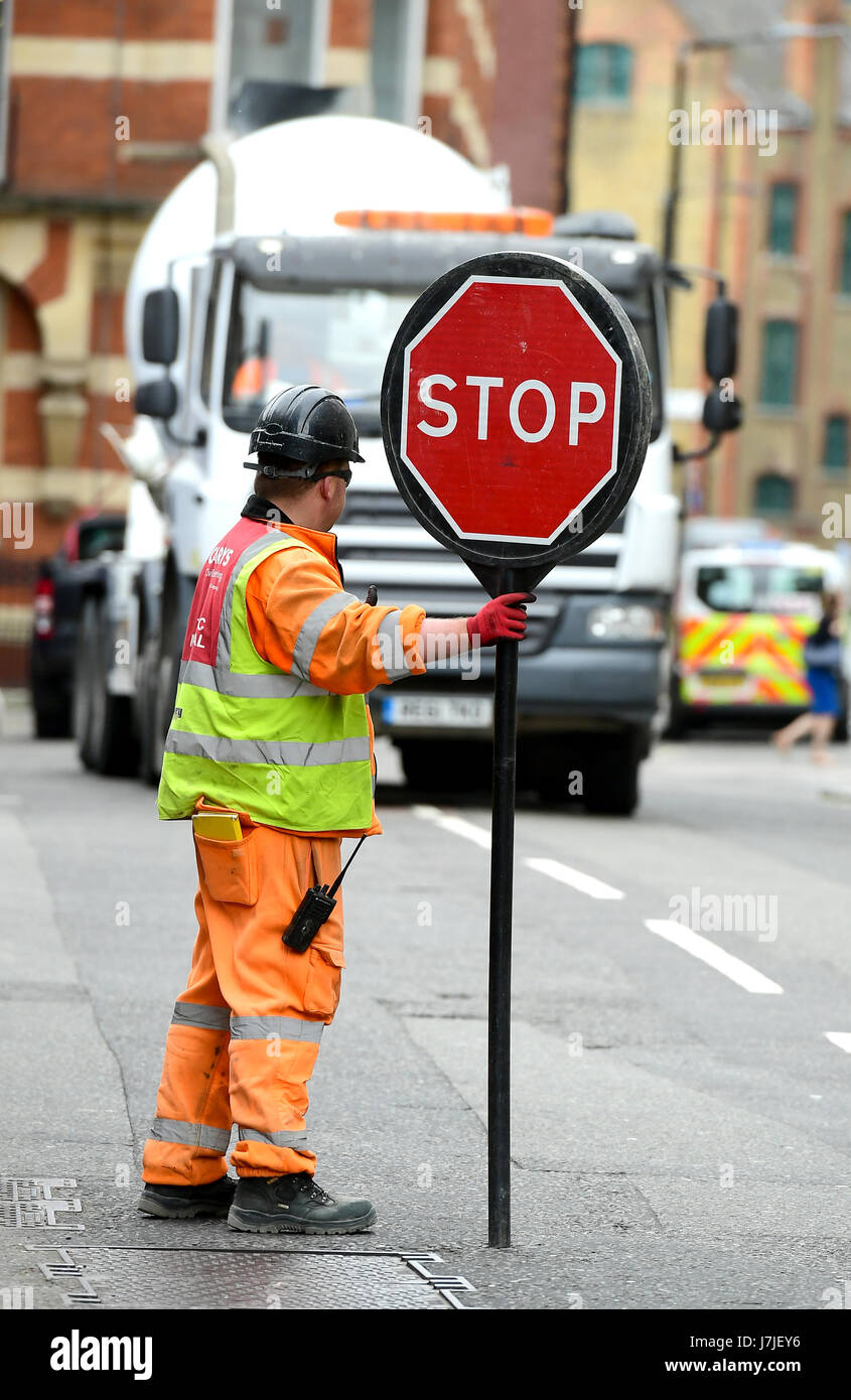 General view of a temporary stop sign directing traffic in London Stock ...