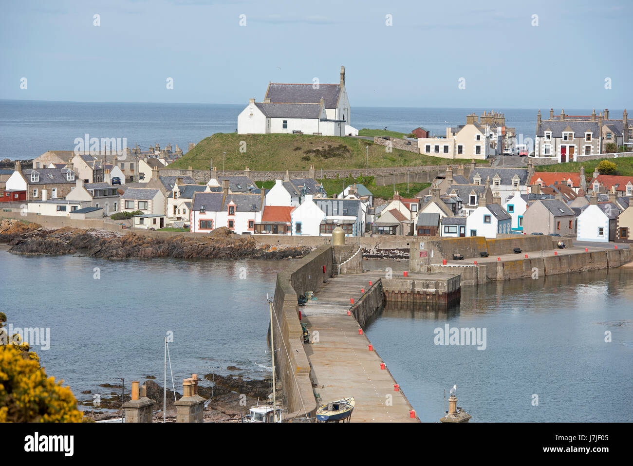 Findochty harbour with the town and Church beyond Stock Photo - Alamy