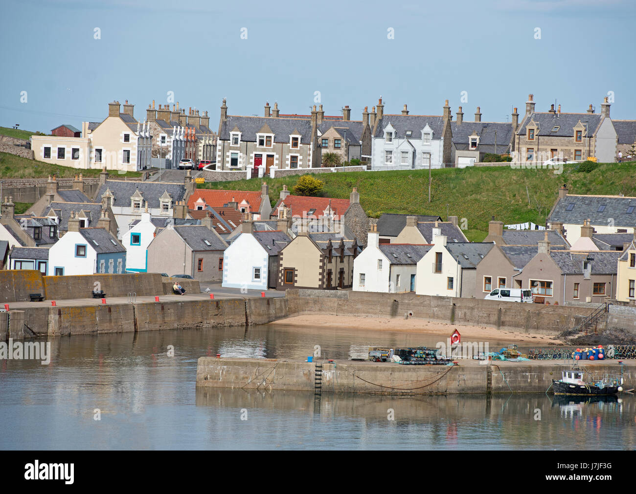 Findochty harbour with the town and Church beyond Stock Photo - Alamy