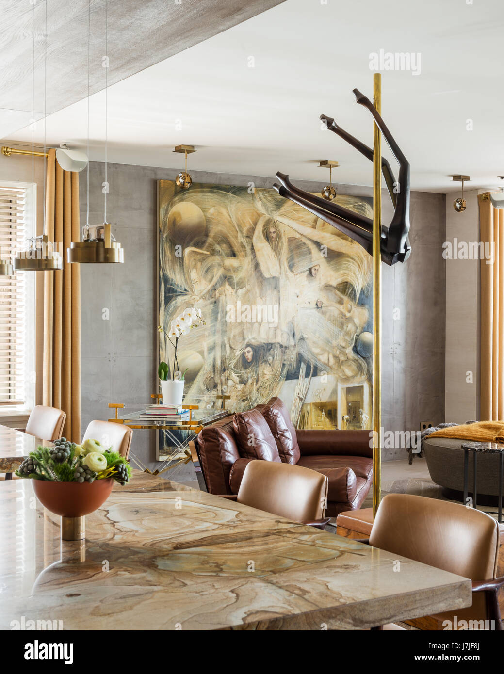 Laura Meroni brass hanging lights above custom made stonewood marble ...