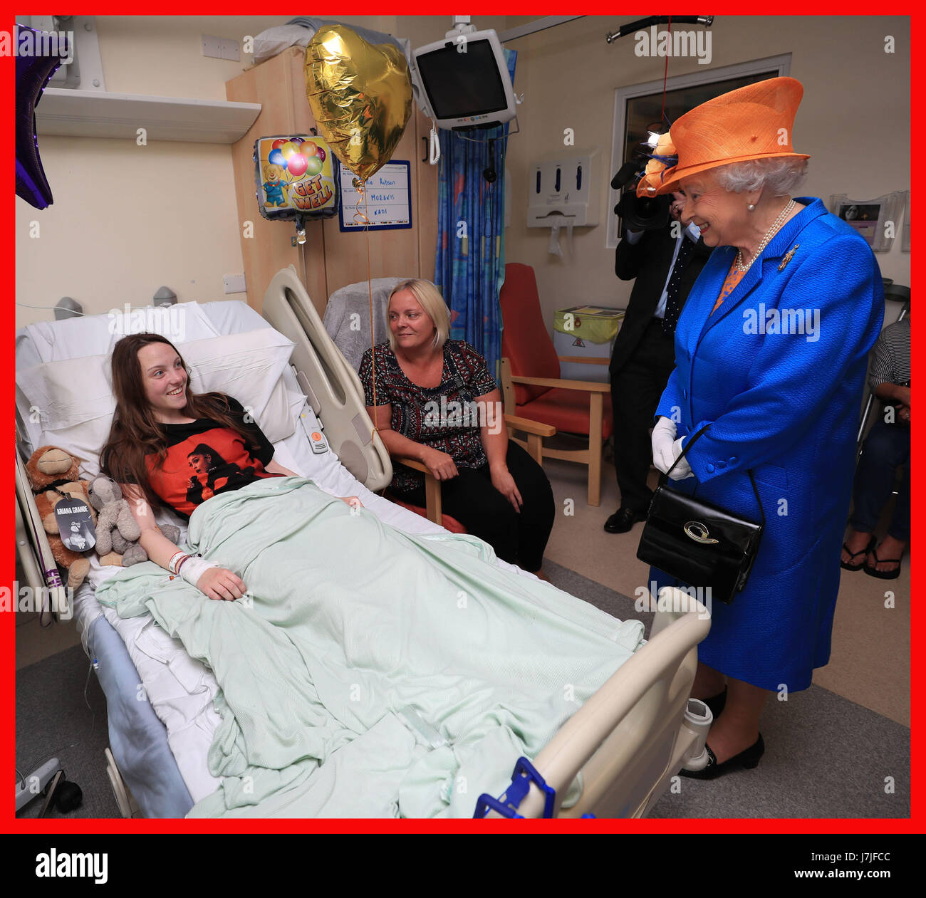 Queen Elizabeth II speaks to Millie Robson, 15, from Co Durham, and her ...