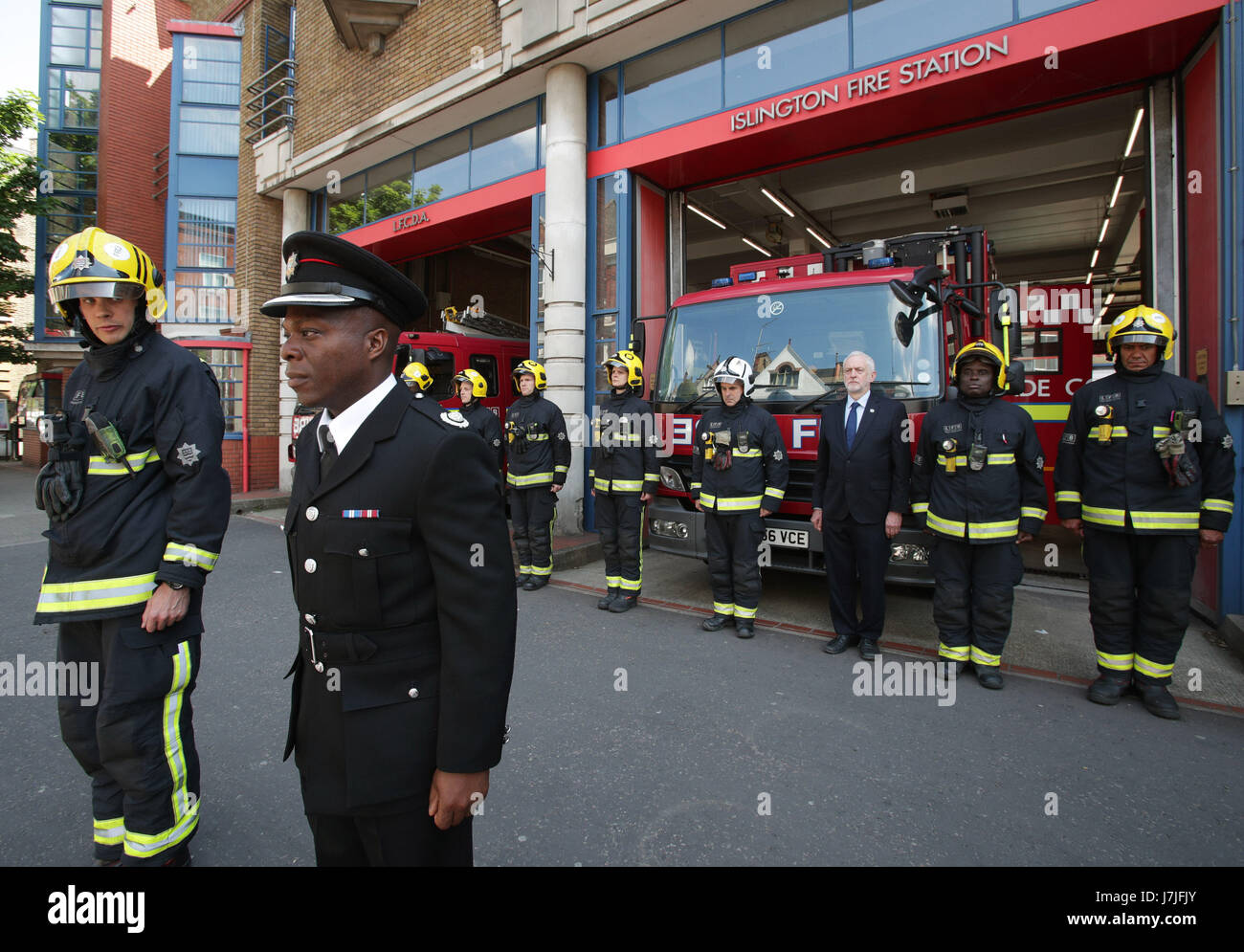 Labour leader Jeremy Corbyn (third right back) joins fire fighters at ...