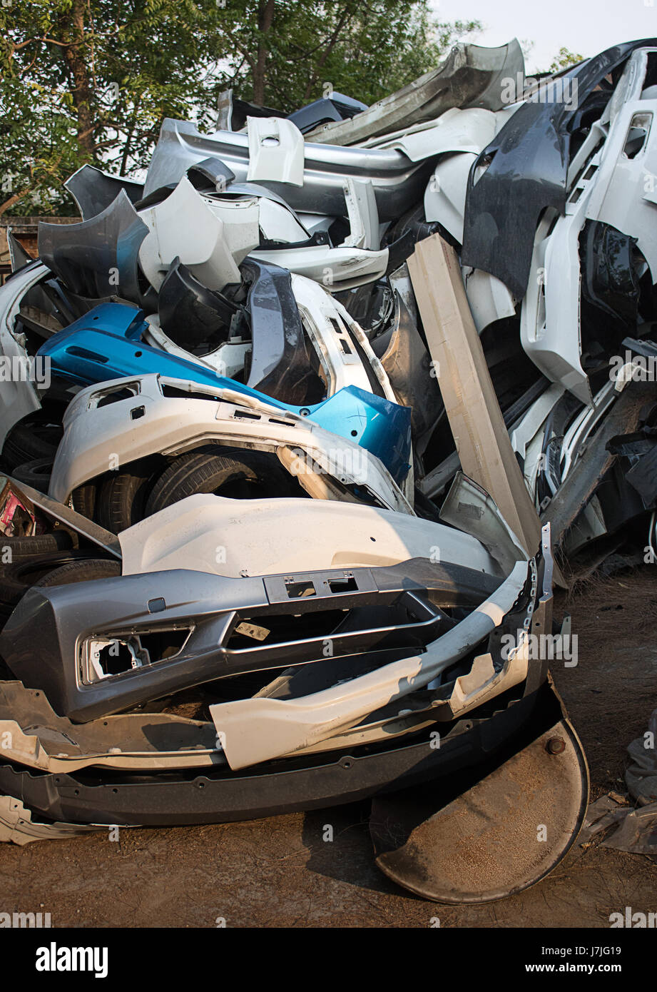 stack of car parts in garage Stock Photo - Alamy