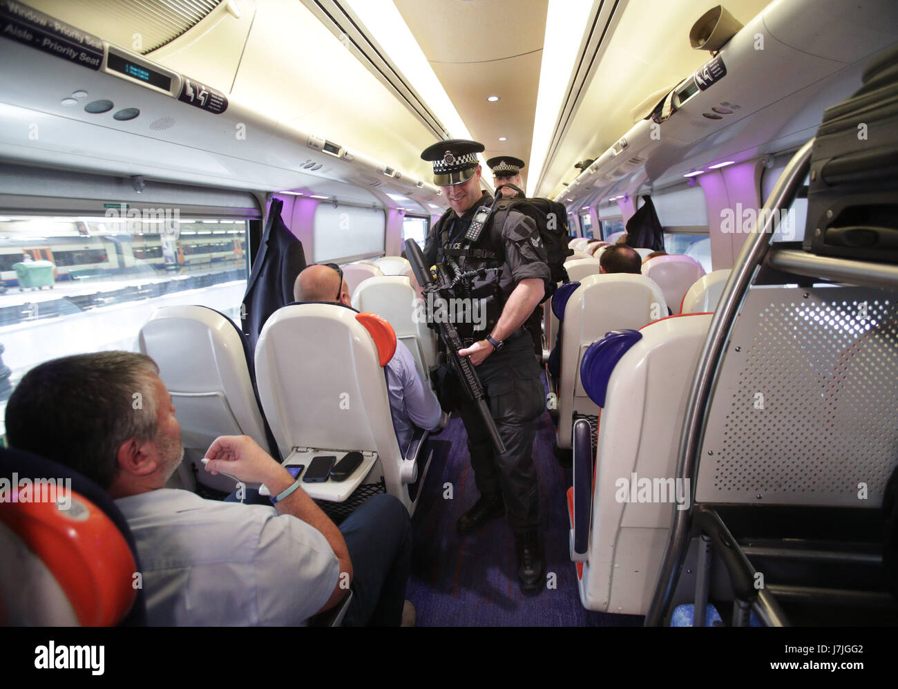 Armed British Transport Police Specialist Operations officers on board ...