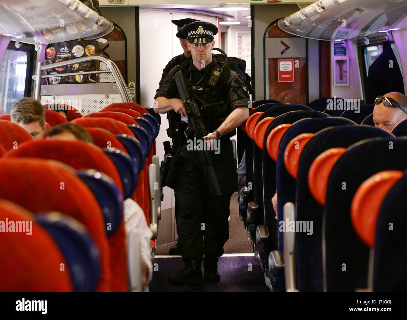 Armed British Transport Police Specialist Operations officers on board ...
