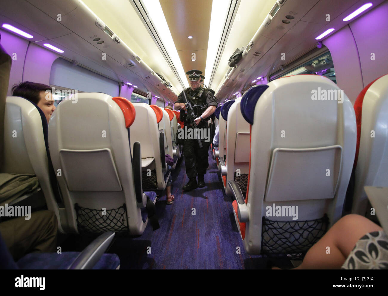 Armed British Transport Police Specialist Operations officers on board ...