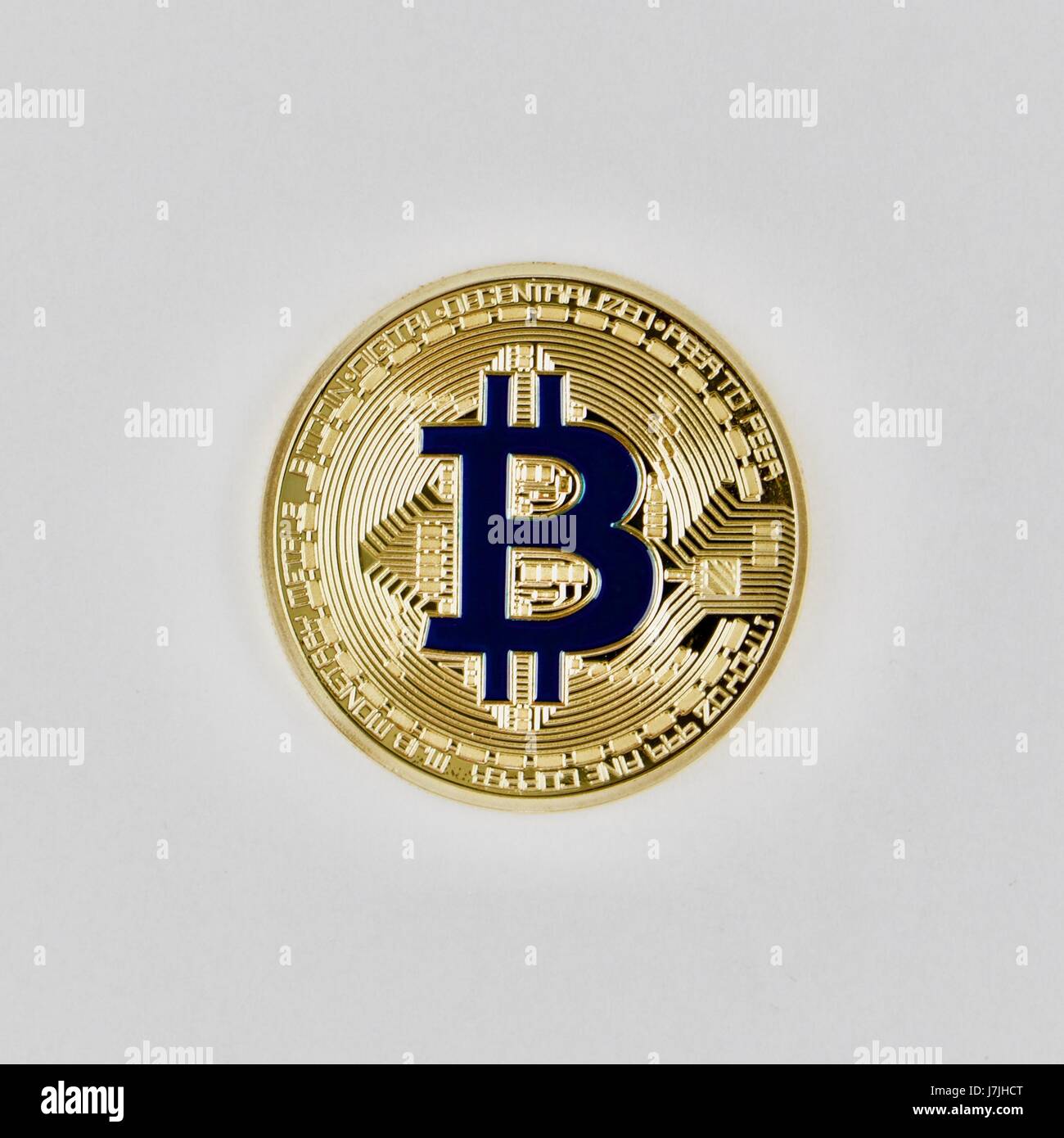 Digital currency physical gold bitcoin coin with a blue sign Stock ...