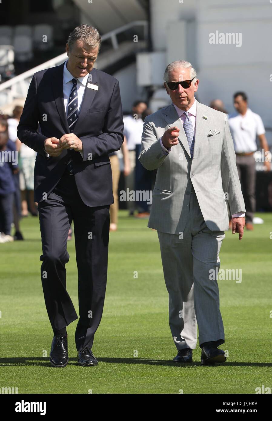 The Prince of Wales (right) talks to Surrey County Cricket Club ...