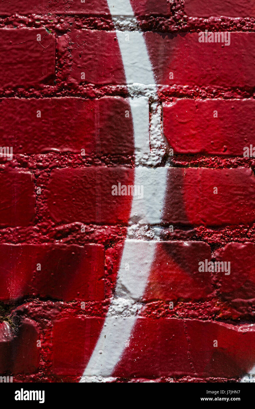 Background of red brick with curved white stripe Stock Photo - Alamy