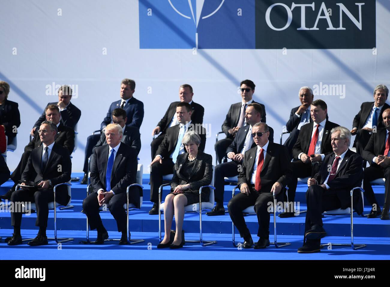 Leaders sit on the stage ahead of a photo opportunity during the North ...