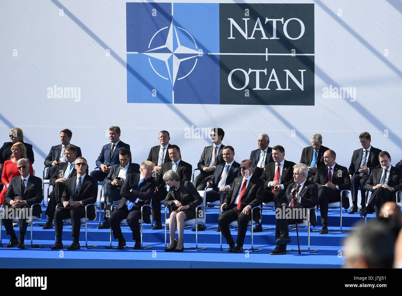 Leaders sit on the stage ahead of a photo opportunity during the North ...
