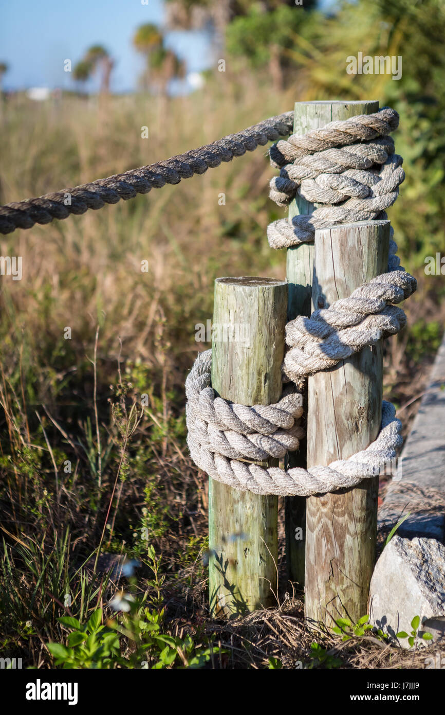 Rope fence near beach background Stock Photo - Alamy