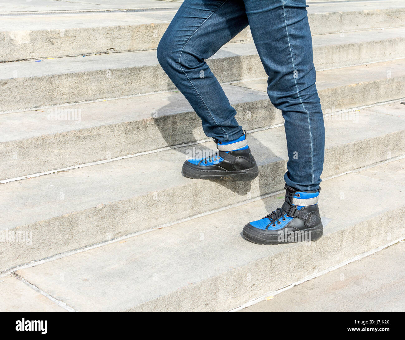 Girl walking down steps hi-res stock photography and images - Alamy