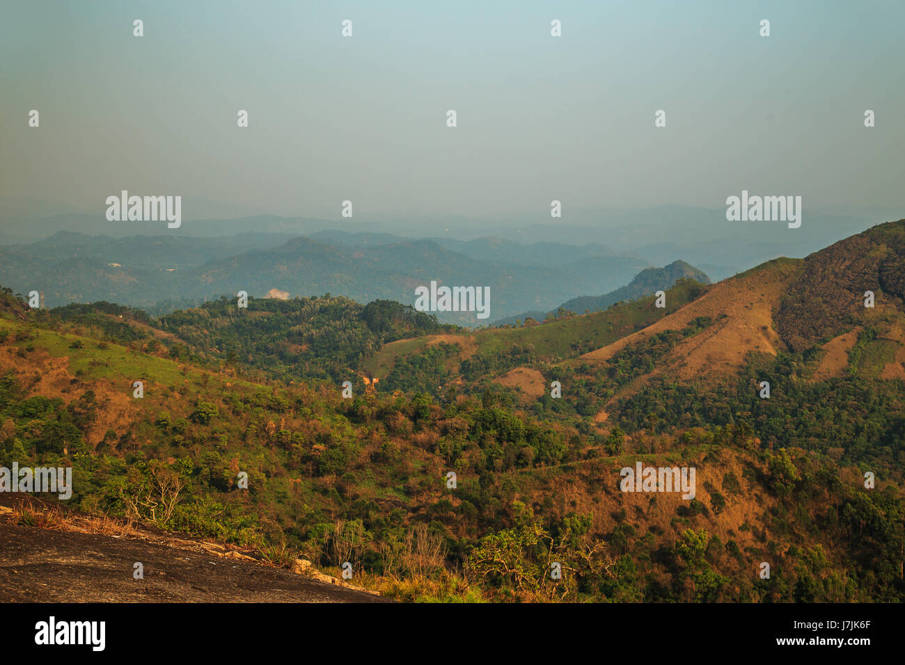 Beautiful sunset in the mountains. Munnar, Kerala state, South India ...