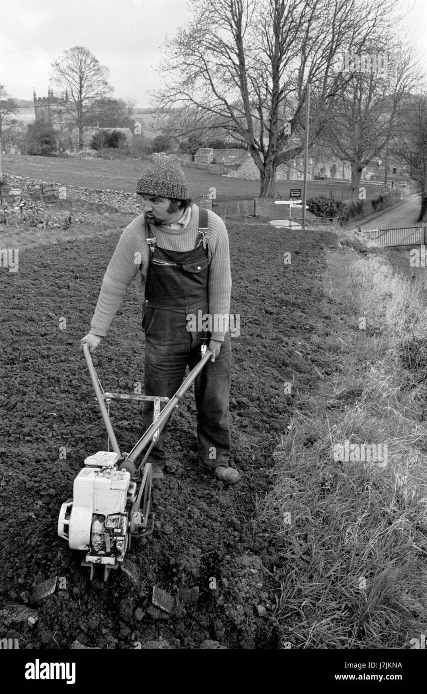 1970s Britain UK. Farmer ploughing small holding Village life 1975 The ...