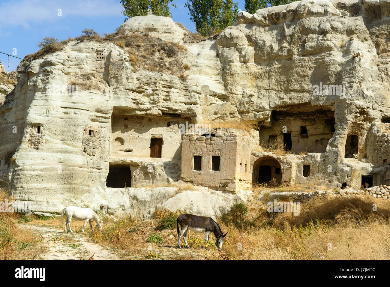 View of cave houses in rock formation at Ortahisar. Cappadocia ...