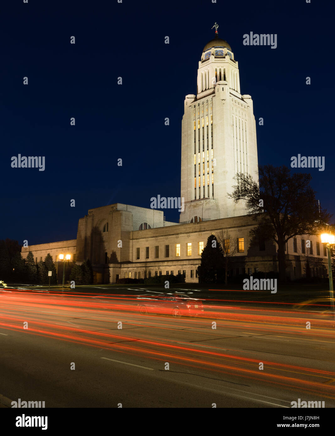 Cars Sreak By at Night in front of Lincoln Nebraska State Capital ...