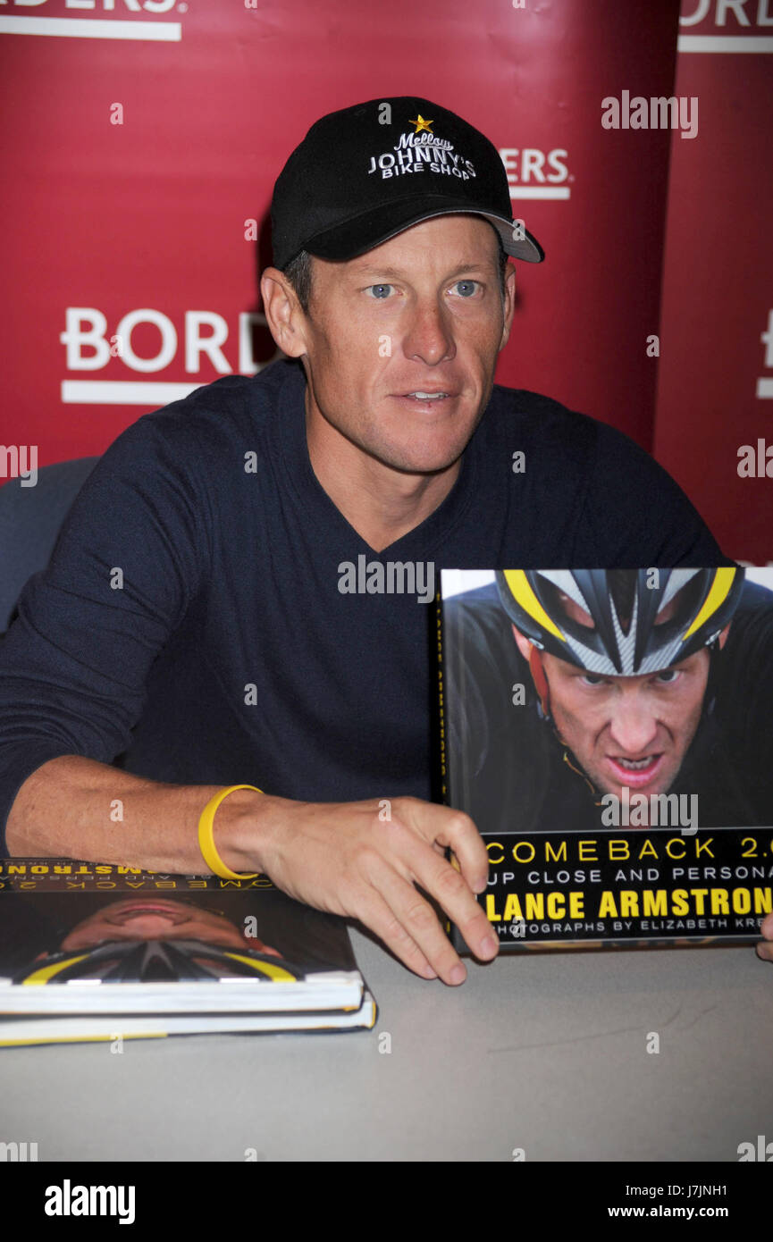 Lance Armstrong signs copies of his new book 'Comeback 2.0: Up Close ...