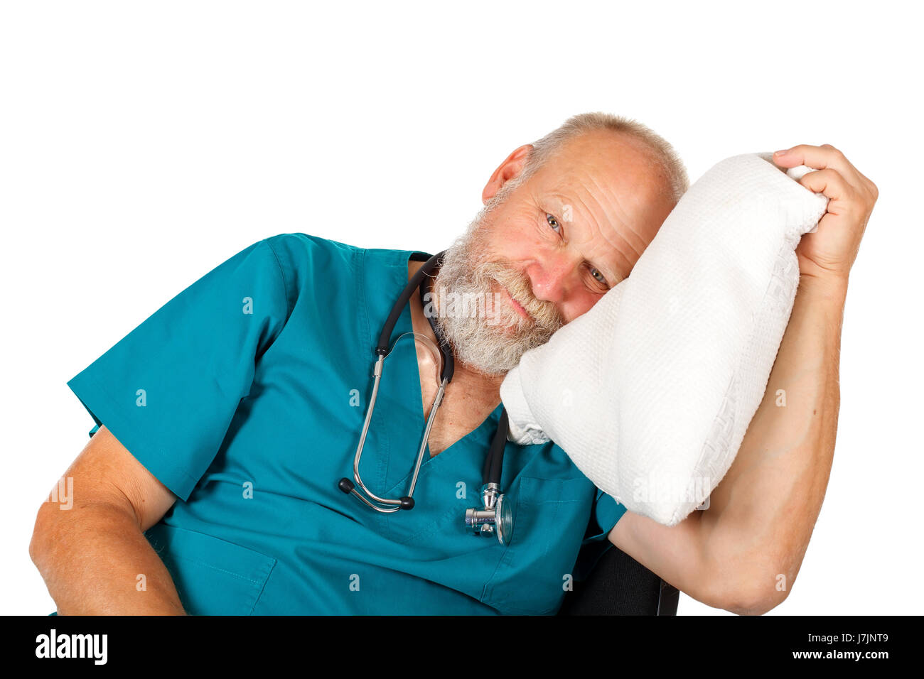 Picture of a senior doctor being tired after a long shift Stock Photo ...