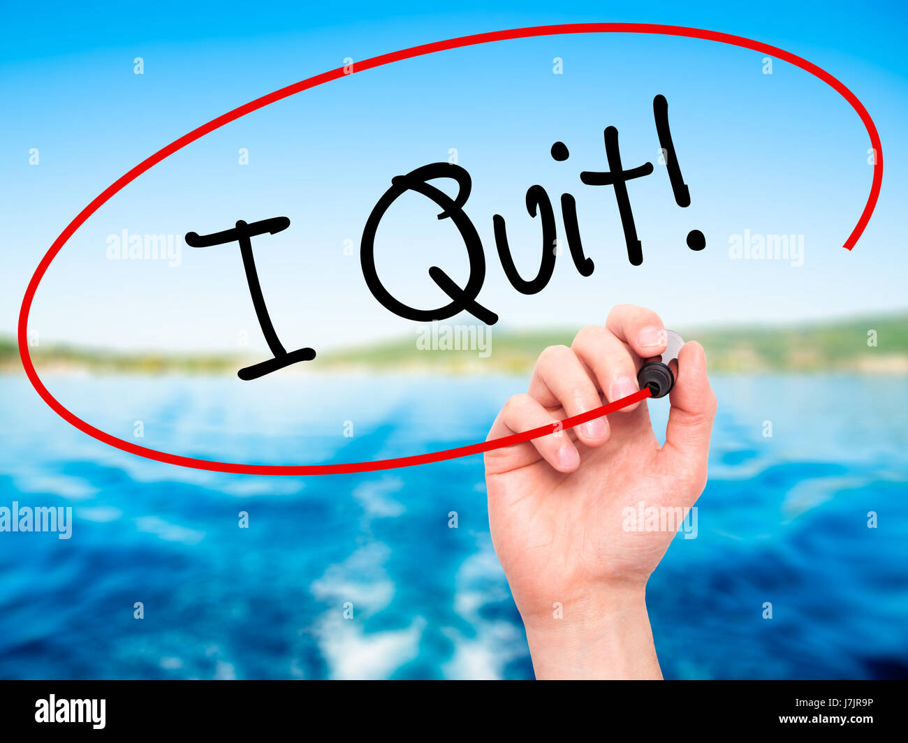 Man Hand writing I Quit! with black marker on visual screen. Isolated ...