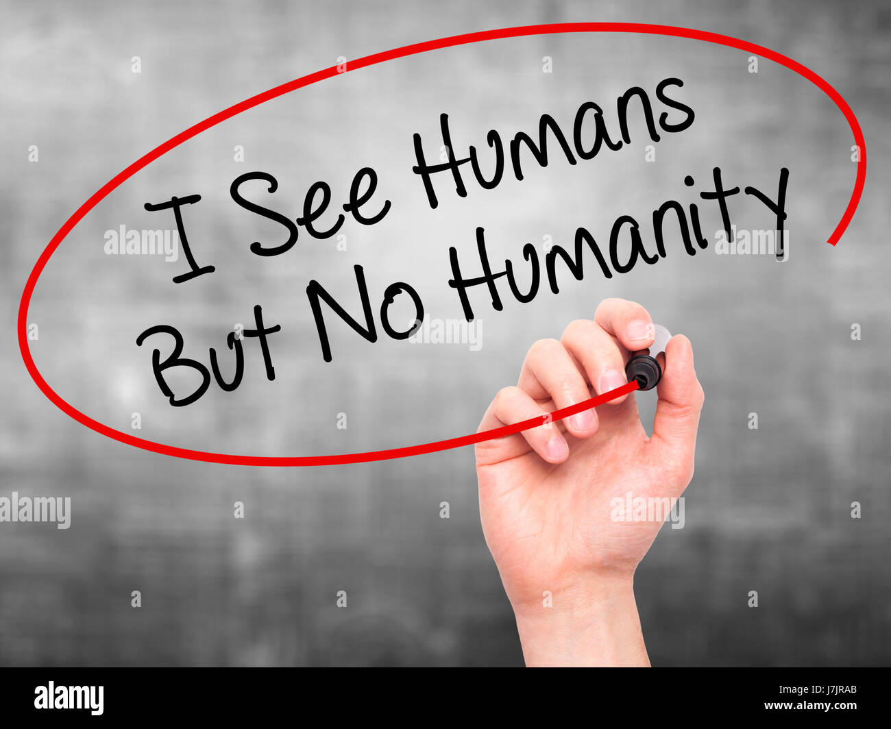 Man Hand writing I See Humans But No Humanity with black marker on ...