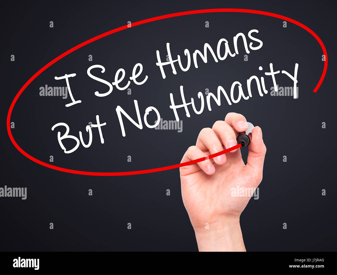 Man Hand writing I See Humans But No Humanity with black marker on ...