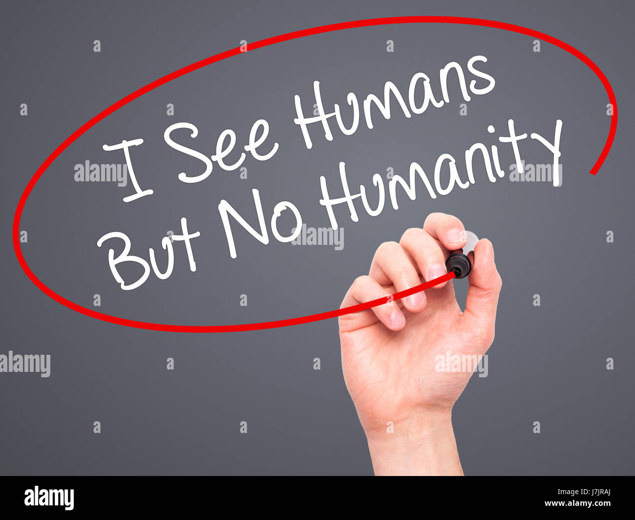 Man Hand writing I See Humans But No Humanity with black marker on ...