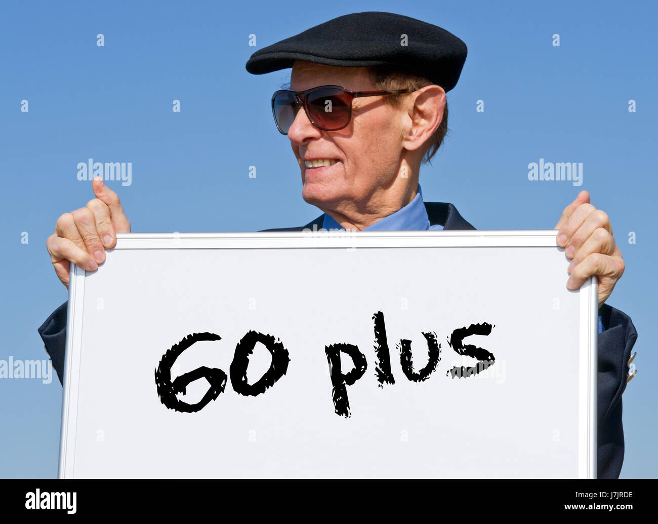 senior with shield - 60 plus Stock Photo - Alamy