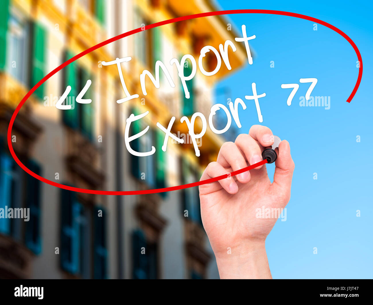 Man Hand writing Import - Export with black marker on visual screen ...