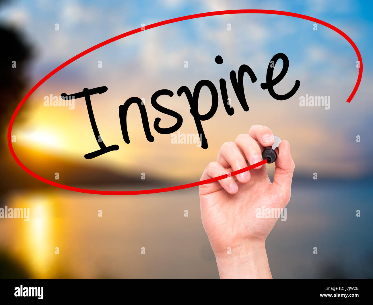 Man Hand writing Inspire with black marker on visual screen. Isolated ...