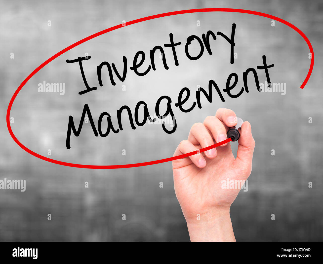 Man Hand writing Inventory Management with black marker on visual ...
