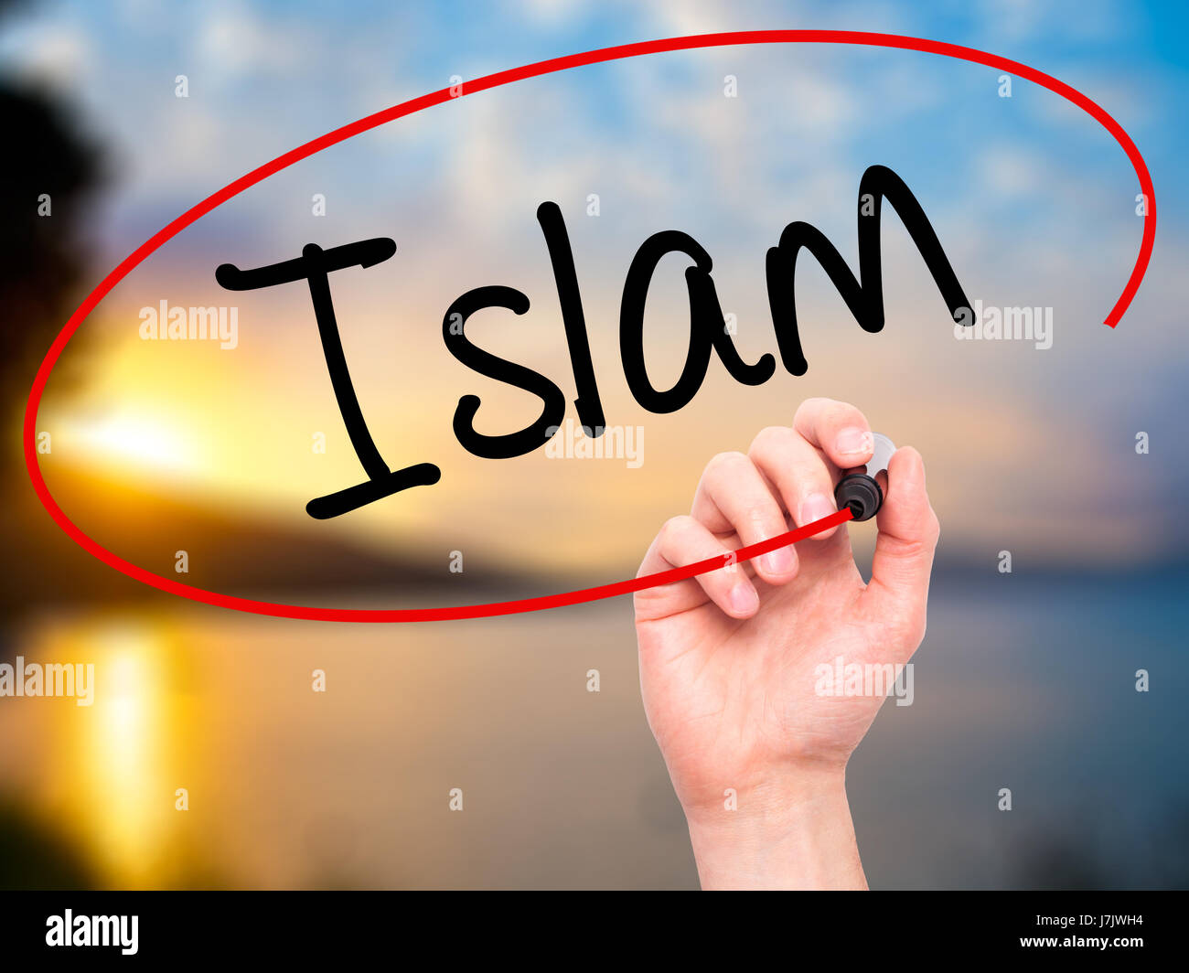 Man Hand writing Islam with black marker on visual screen. Isolated on ...