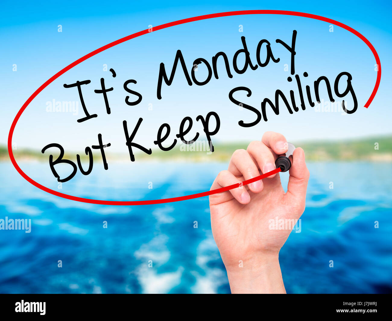 Man Hand writing It's Monday But Keep Smiling with black marker on ...