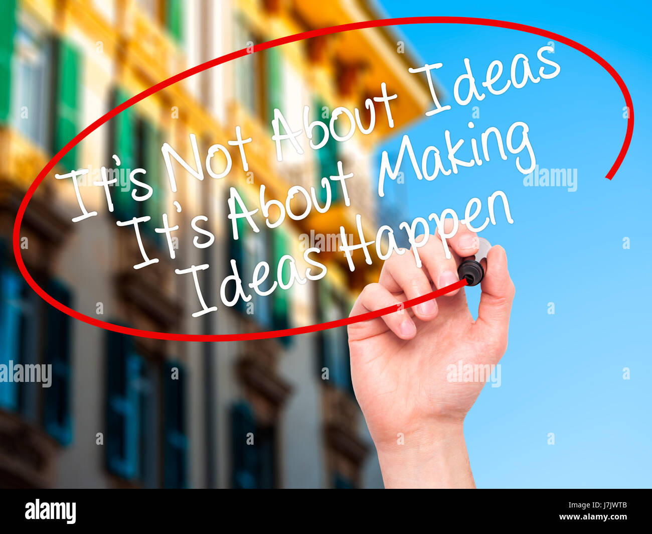 Man Hand writing It's Not About Ideas Its About Making Ideas Happen ...