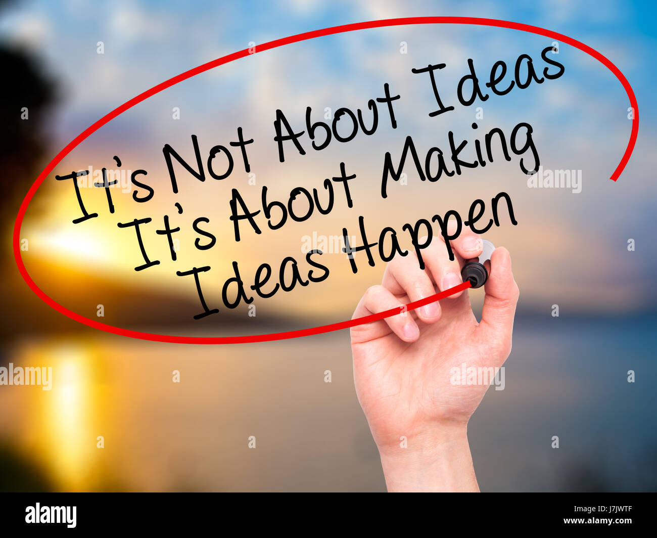 Man Hand writing It's Not About Ideas Its About Making Ideas Happen ...