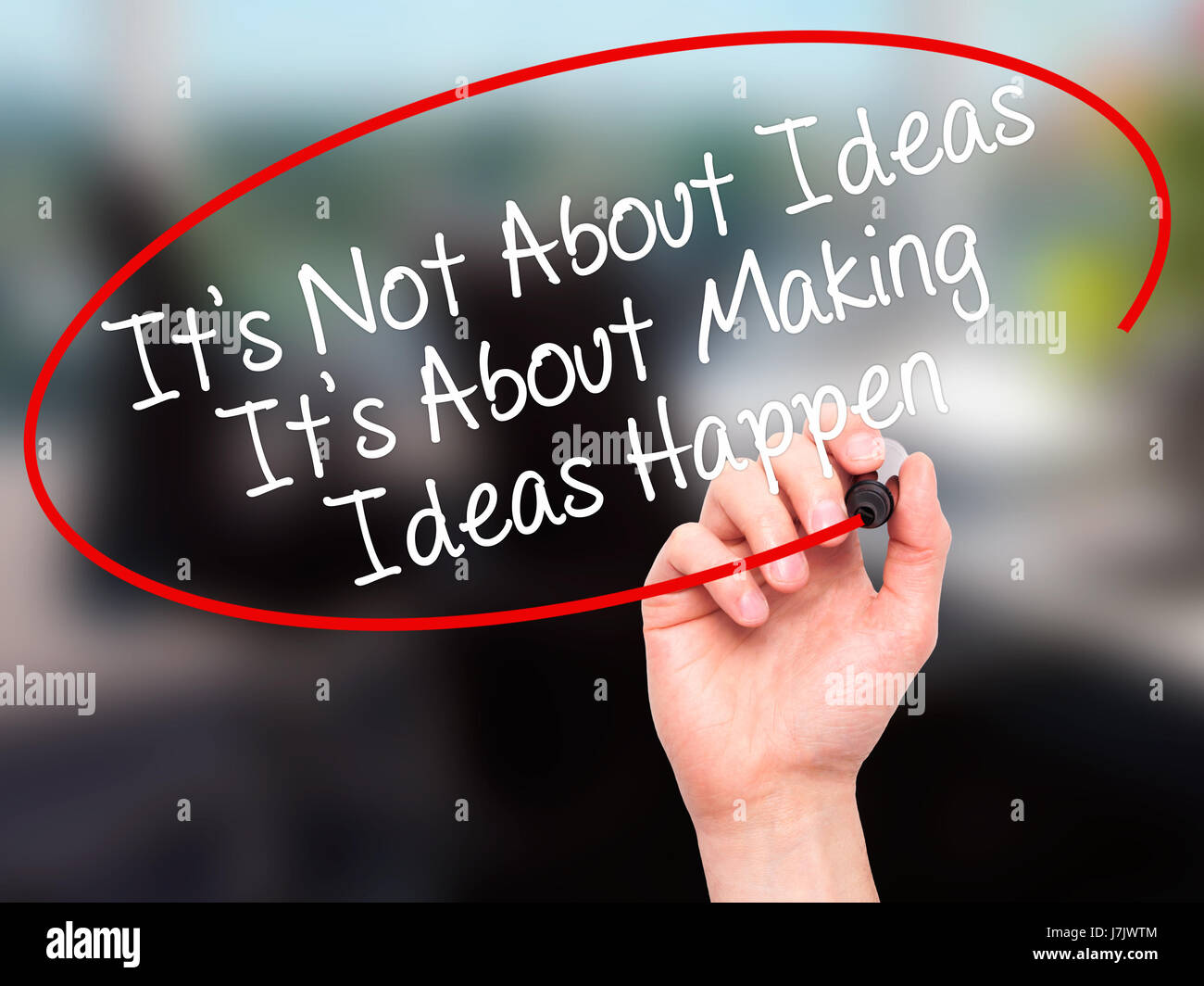Man Hand writing It's Not About Ideas Its About Making Ideas Happen ...