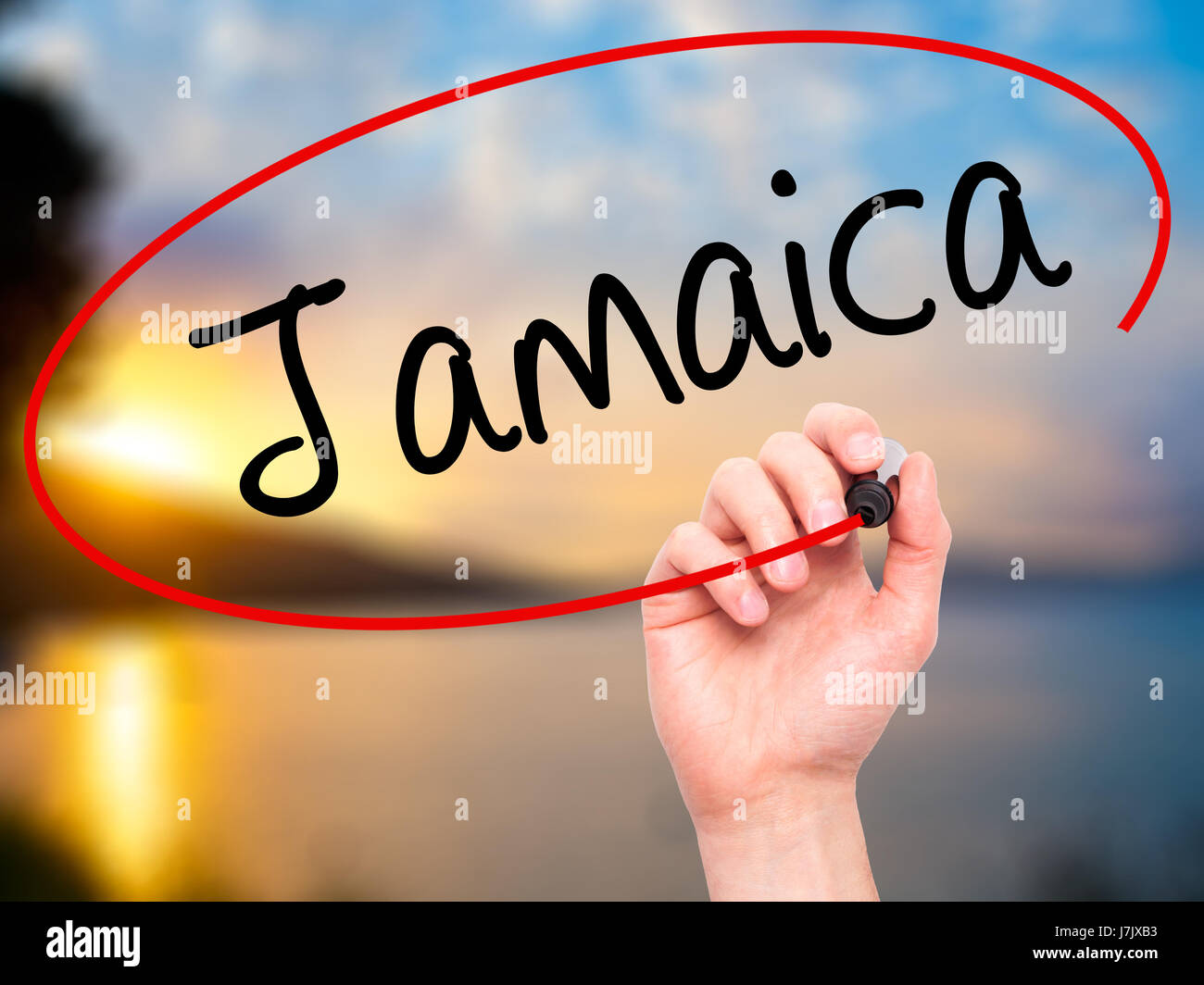 Man Hand writing Jamaica with black marker on visual screen. Isolated ...
