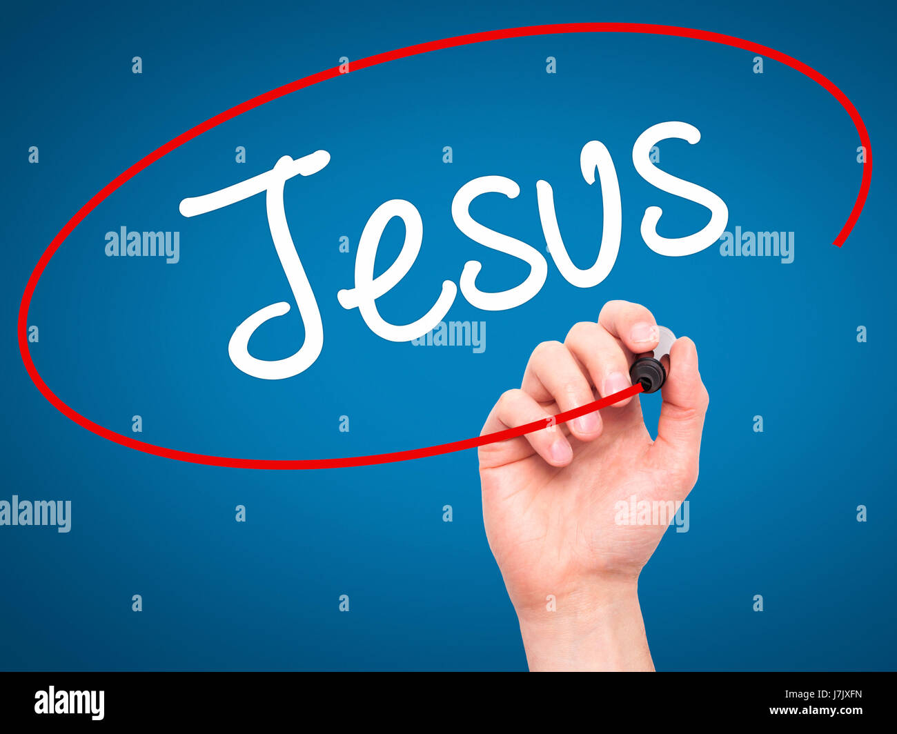 Man Hand writing Jesus with black marker on visual screen. Isolated on ...