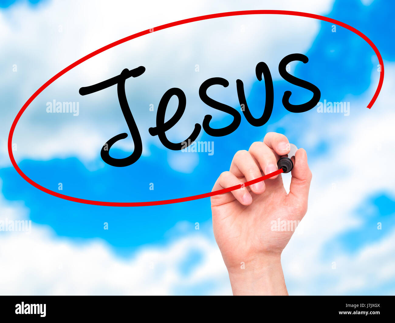 Man Hand writing Jesus with black marker on visual screen. Isolated on ...