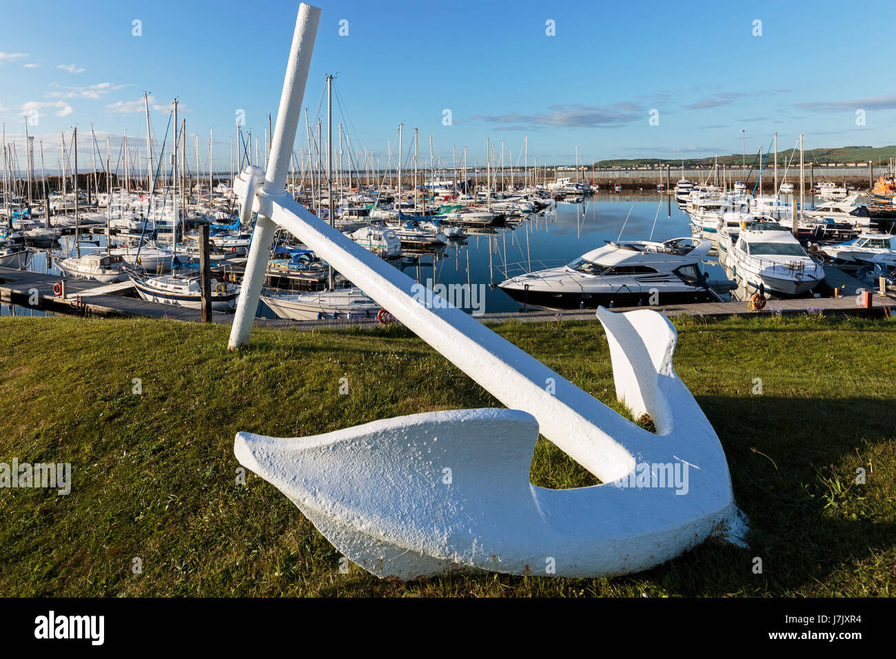 Troon marina with an old painted anchor on the quayside, Troon ...