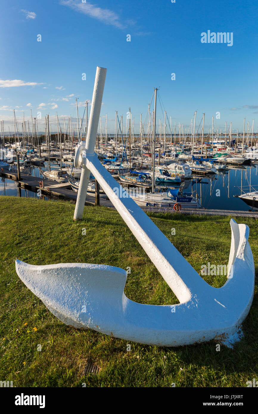 Troon marina with an old painted anchor on the quayside, Troon ...