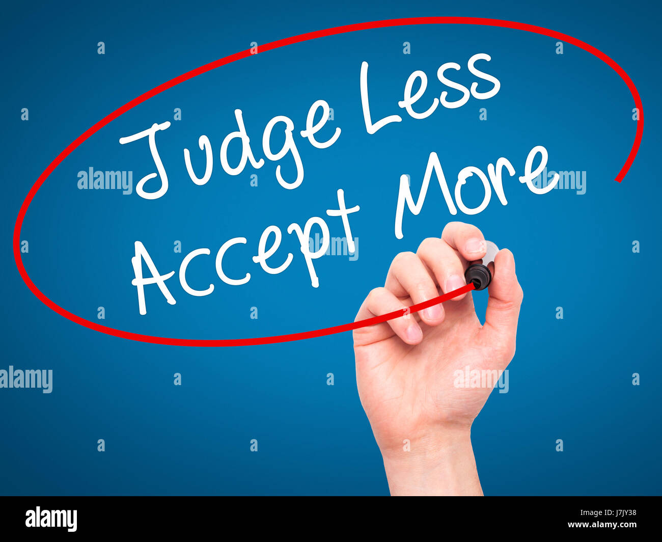 Man Hand writing Judge Less Accept More with black marker on visual ...