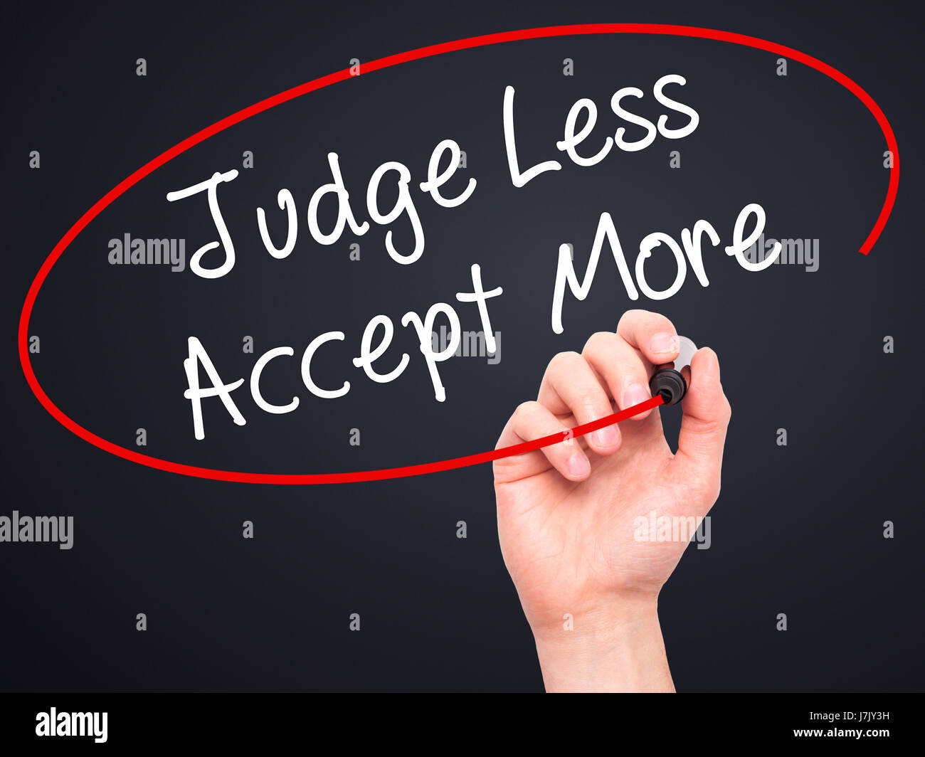 Man Hand writing Judge Less Accept More with black marker on visual ...