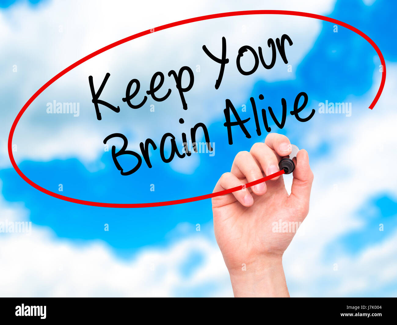 Man Hand writing Keep Your Brain Alive with black marker on visual ...