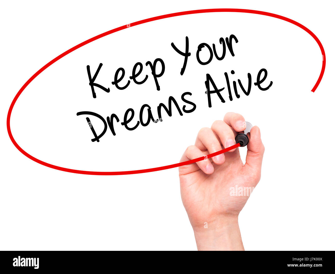 Man Hand writing Keep Your Dreams Alive with black marker on visual ...