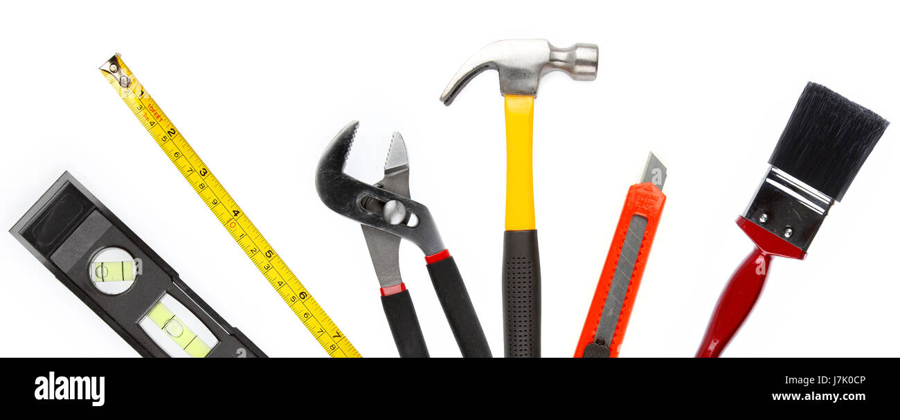 Assortment of tools on plain background Stock Photo - Alamy