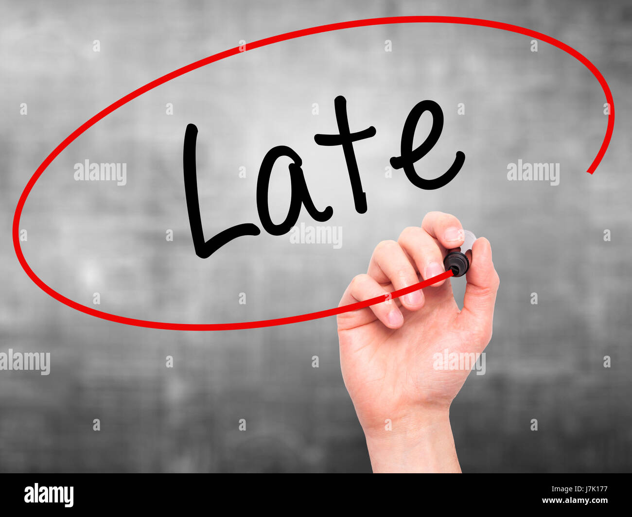 Man Hand writing Late with black marker on visual screen. Isolated on ...