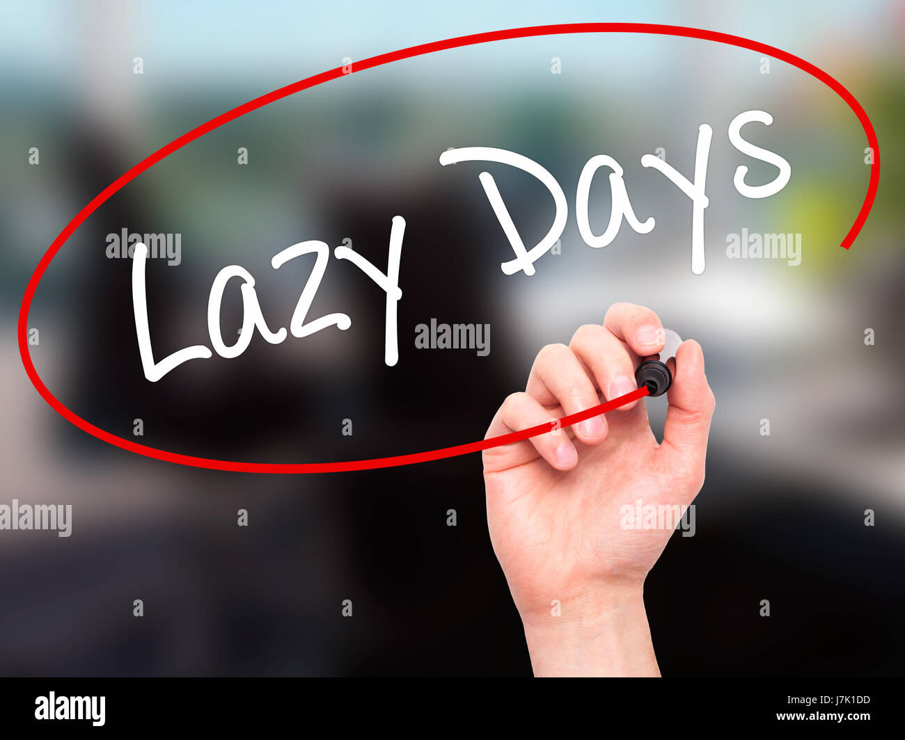 Man Hand writing Lazy Days with black marker on visual screen. Isolated ...