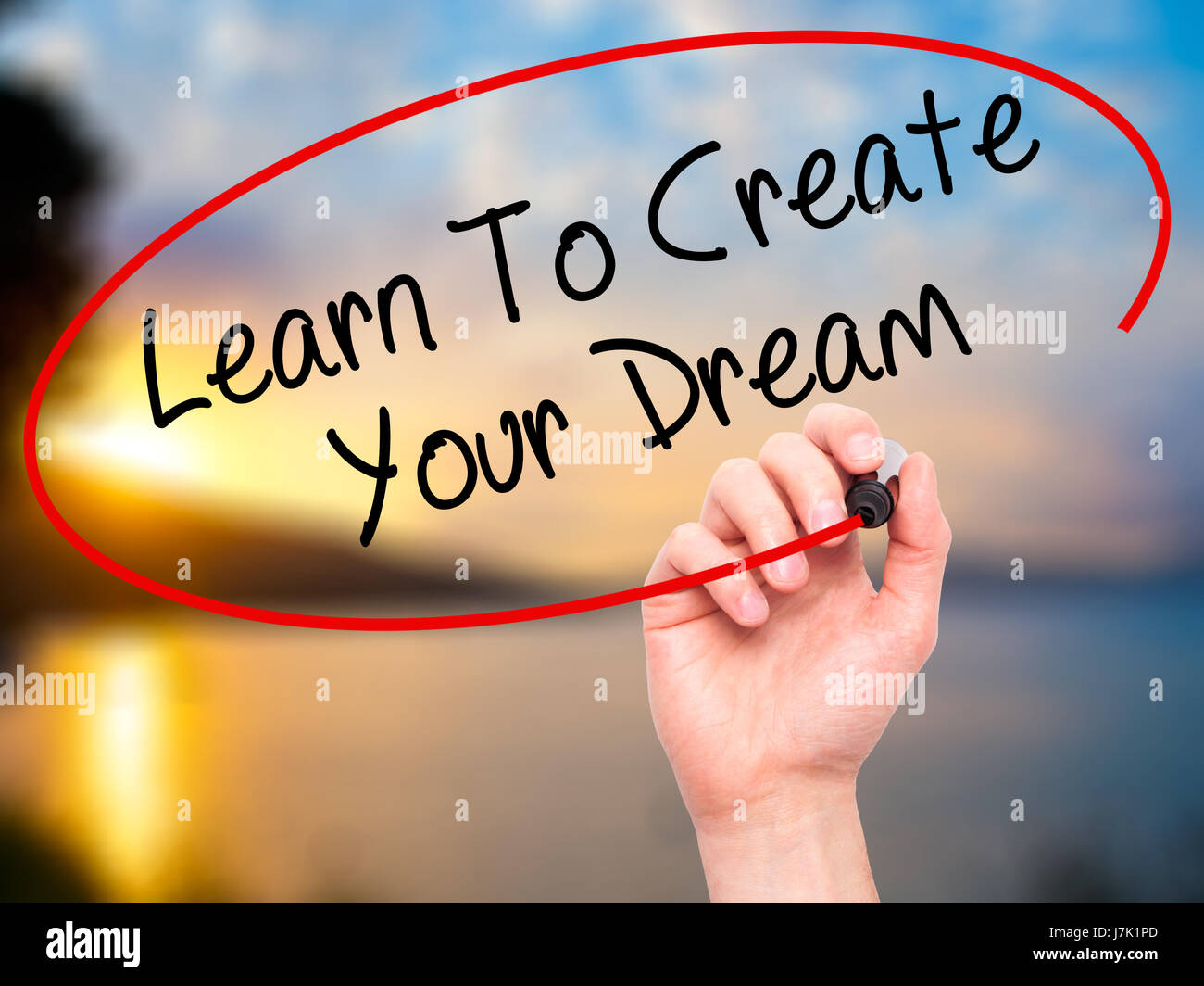 Man Hand writing Learn To Create Your Dream with black marker on visual ...